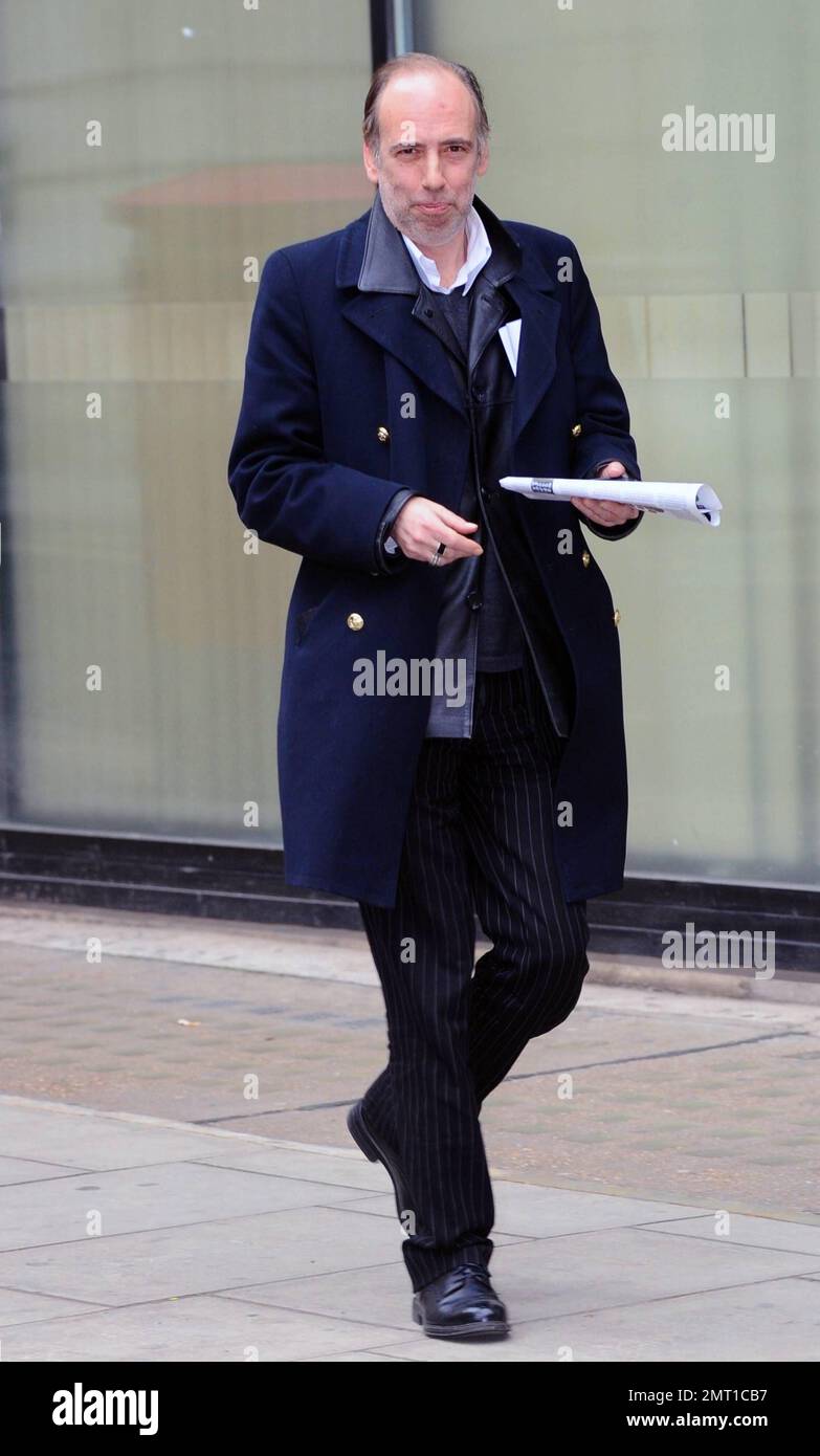 A legend of punk rock, The Clash's Mick Jones smiles for the cameras as ...