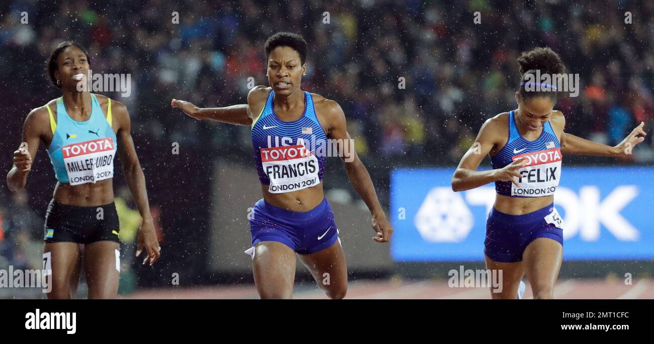 United States' Phyllis Francis, center, crosses the line to win the ...