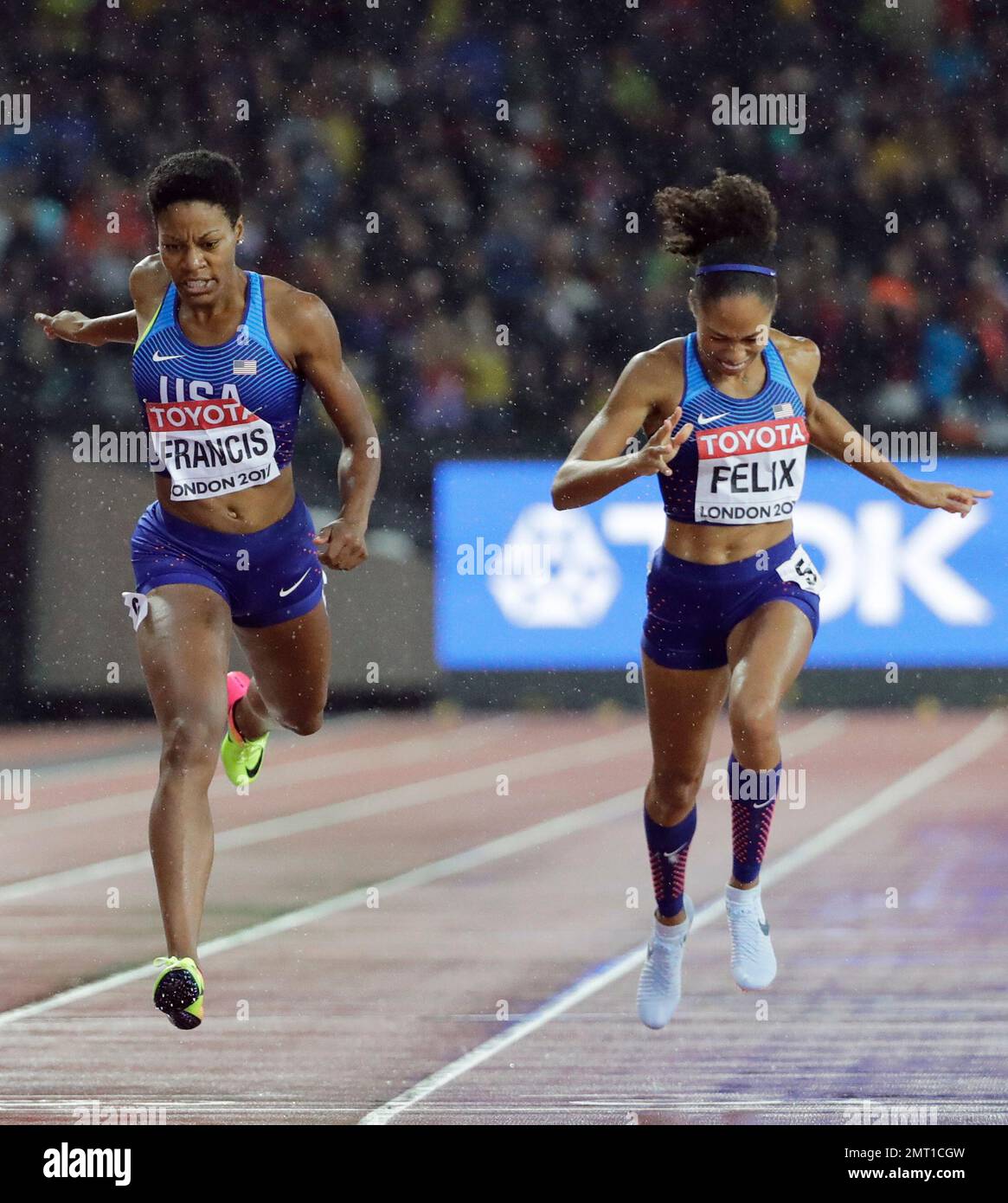 United States' Phyllis Francis, left, crosses the line to win the gold ...