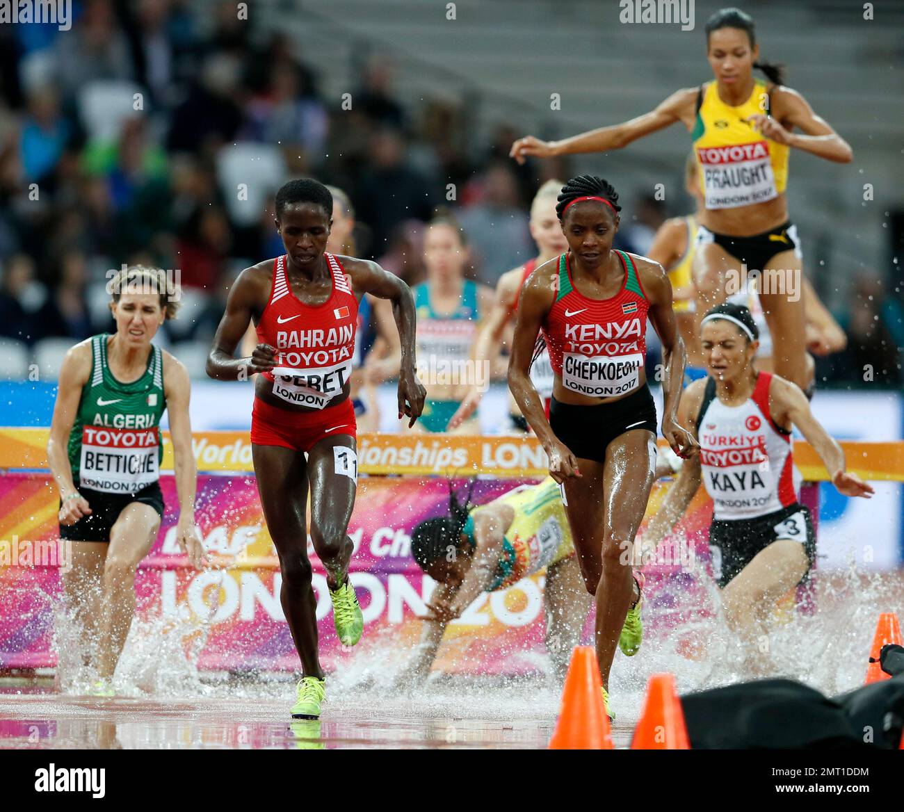 Kenya's Beatrice Chepkoech, center right, and Bahrain's Ruth Jebet ...