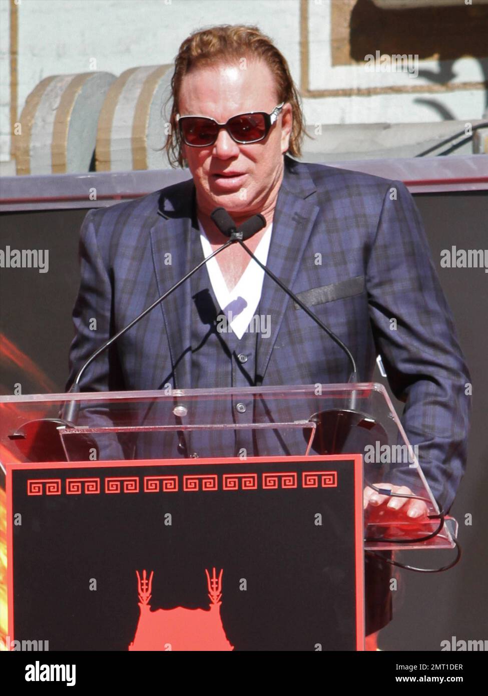 Mickey Rourke becomes immortalized at his Hand and Footprint Cermeony ...
