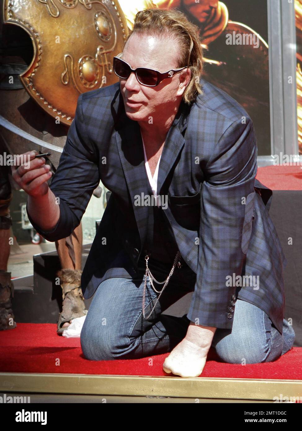 Mickey Rourke becomes immortalized at his Hand and Footprint Cermeony ...