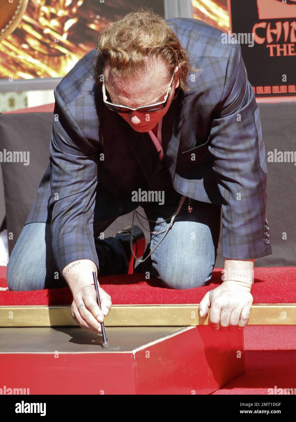 Mickey Rourke becomes immortalized at his Hand and Footprint Cermeony ...