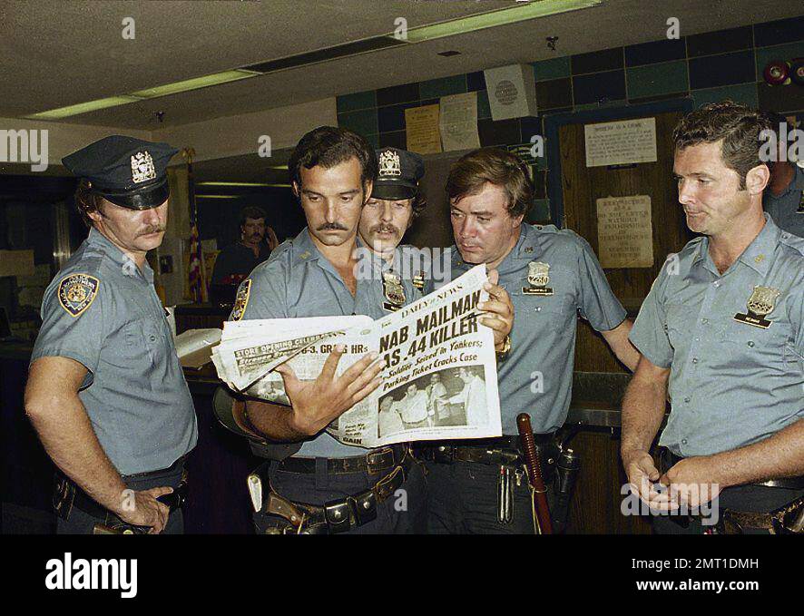 FILE - In this Aug. 11, 1977 file photo, NYPD officers at the 84th ...