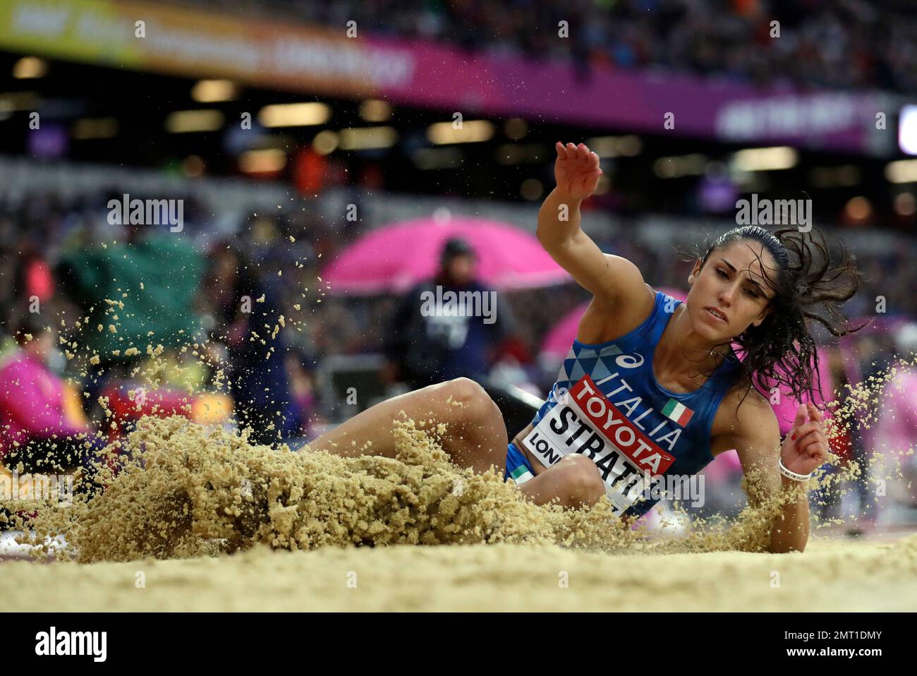 Italy's Laura Strati makes an attempt in the women's long jump ...