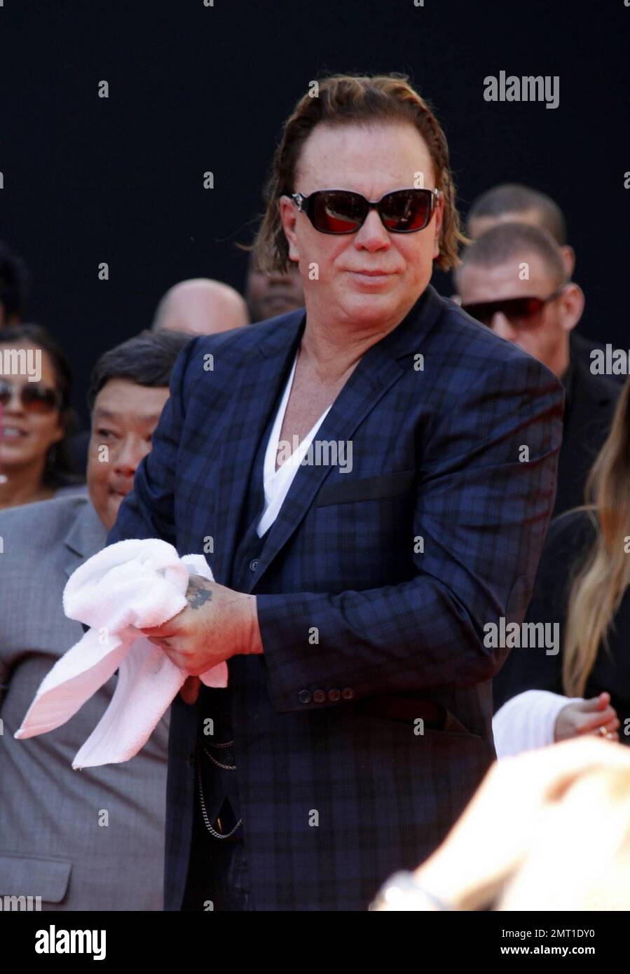 Mickey Rourke is celebrated and immortalized in cement during a ...