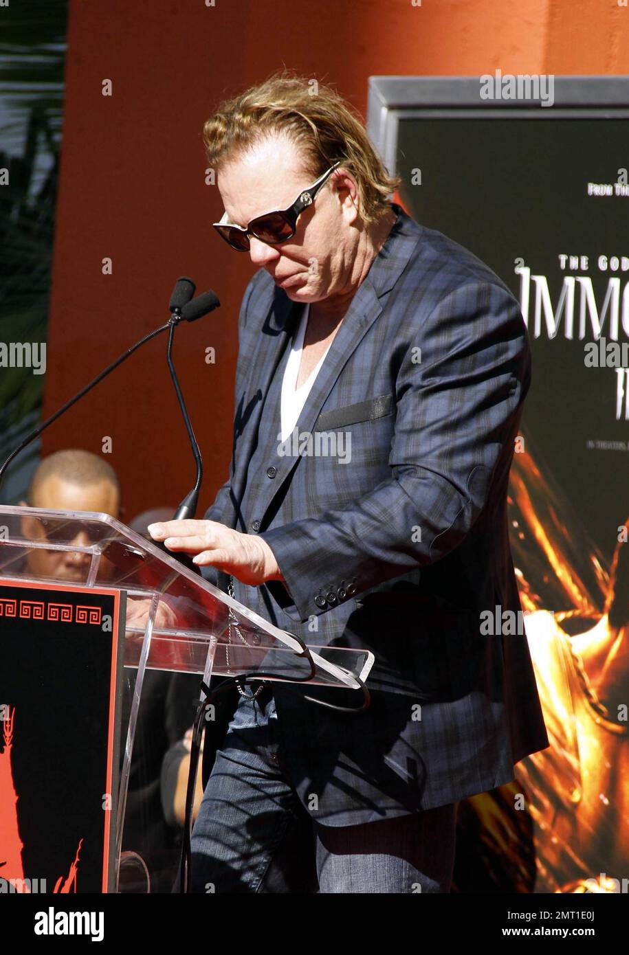 Mickey Rourke is celebrated and immortalized in cement during a ...