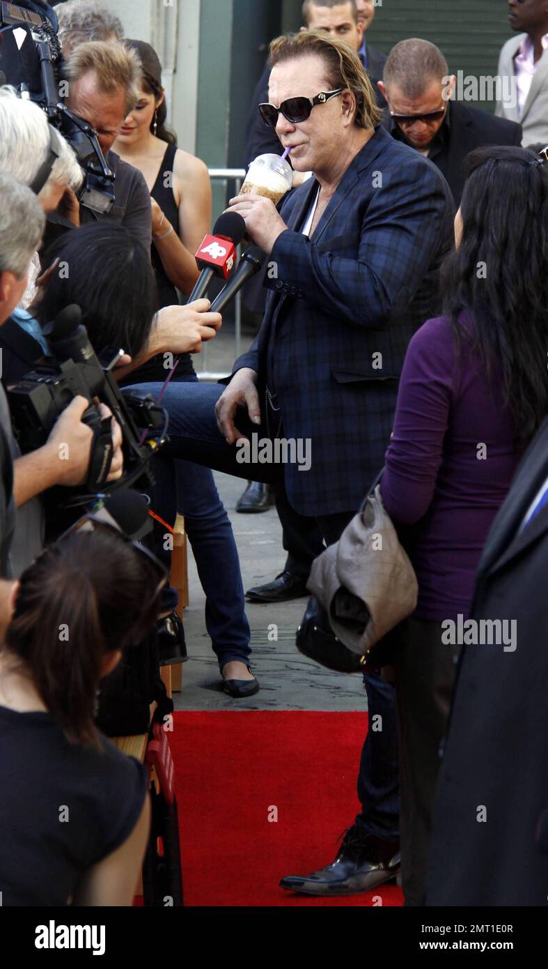 Mickey Rourke is celebrated and immortalized in cement during a ...