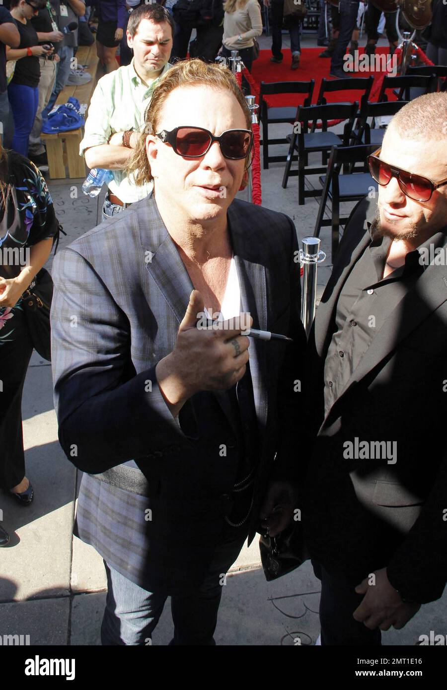 Mickey Rourke is celebrated and immortalized in cement during a ...