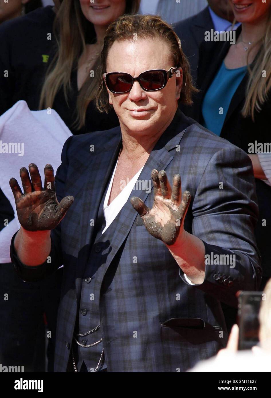 Mickey Rourke is celebrated and immortalized in cement during a ...