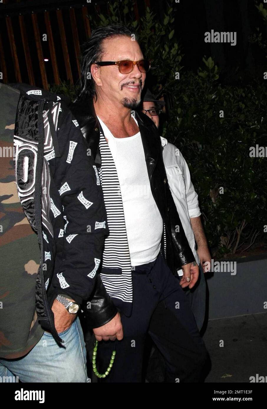 Academy Award-nominated actor Mickey Rourke leaves the nightclub My ...