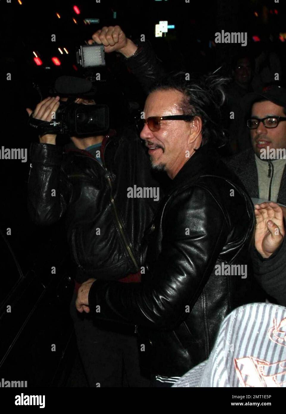 Academy Award-nominated actor Mickey Rourke leaves the nightclub My ...