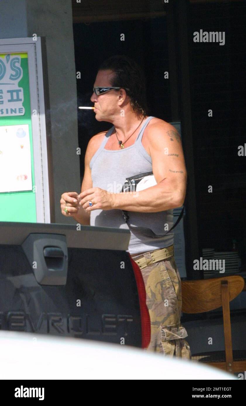 Exclusive!! Mickey Rourke braves the daylight to have a smoke and a ...