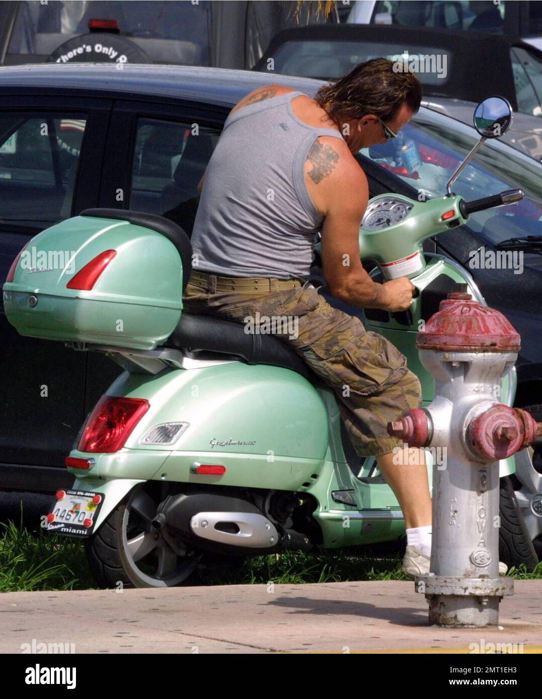 Exclusive!! Mickey Rourke braves the daylight to have a smoke and a ...