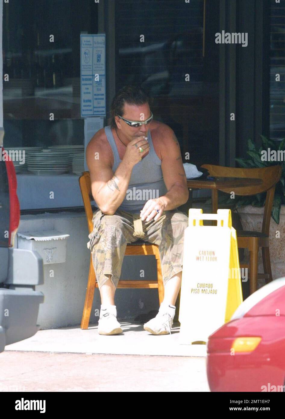 Exclusive!! Mickey Rourke braves the daylight to have a smoke and a ...