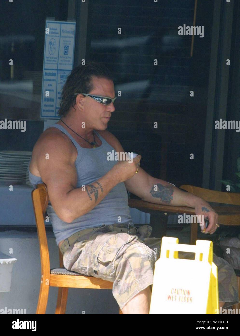 Exclusive!! Mickey Rourke braves the daylight to have a smoke and a ...