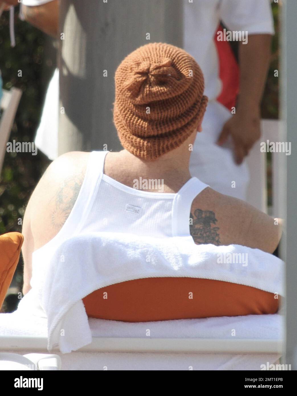 Actor Mickey Rourke wore a woolly hat at his hotel today despite the ...