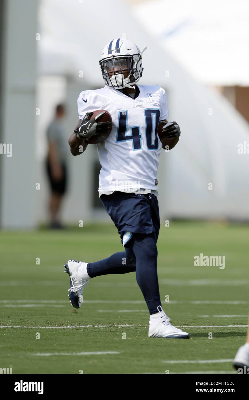 Tennessee Titans running back Brandon Radcliff runs a drill during NFL ...
