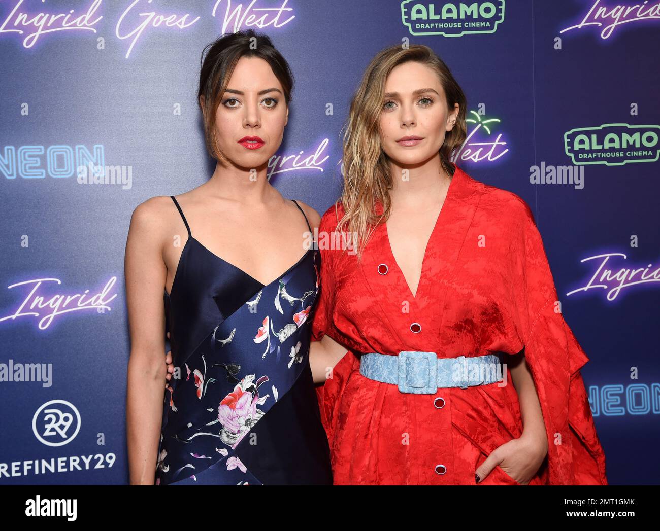 Actors Aubrey Plaza, left, and Elizabeth Olsen attend the premiere of ...