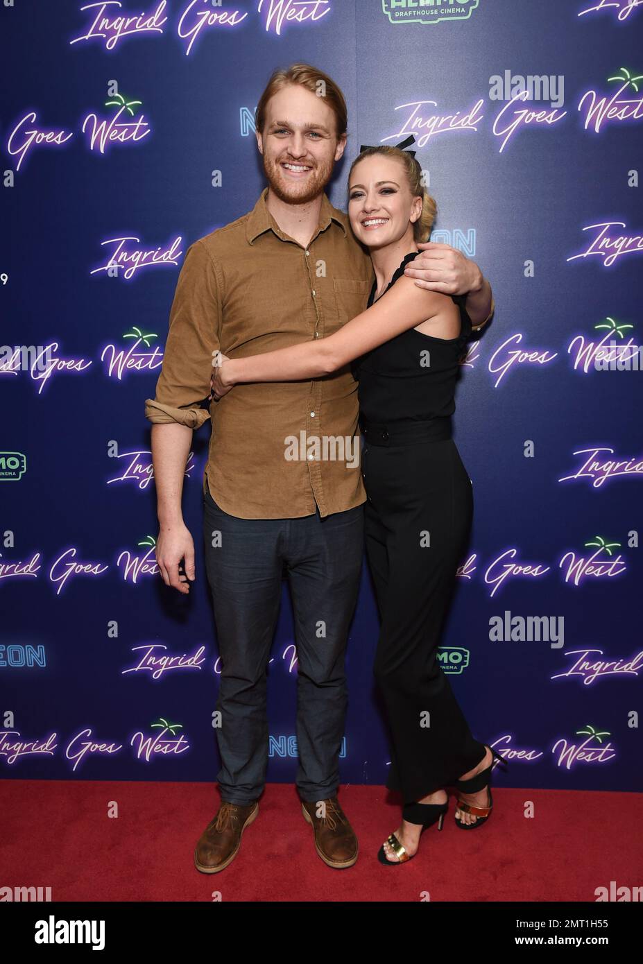 Actors Wyatt Russell, left, and Meredith Hagner attend the premiere of ...