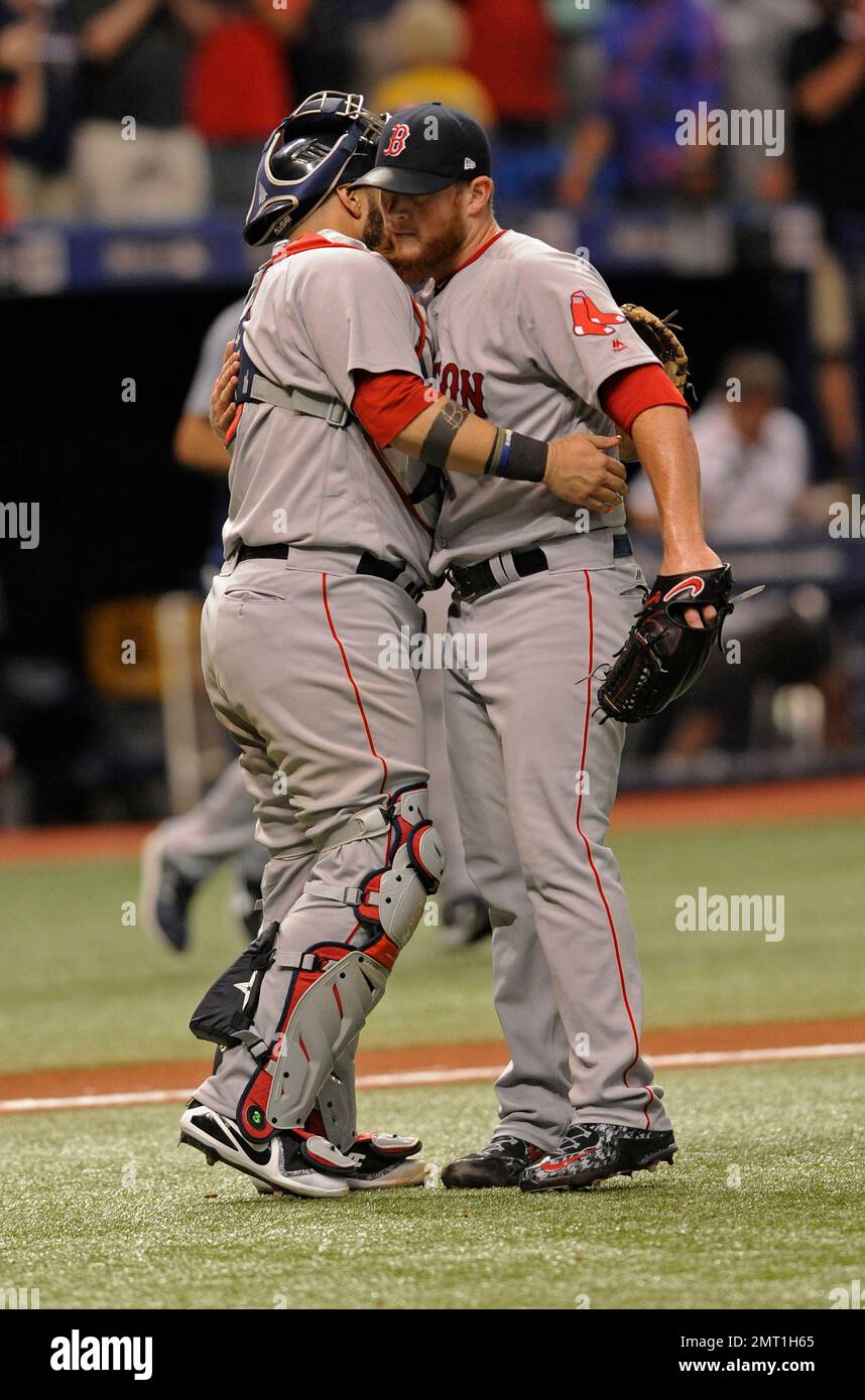 Boston Red Sox catcher Sandy Leon, left, and closer Craig Kimbrel ...