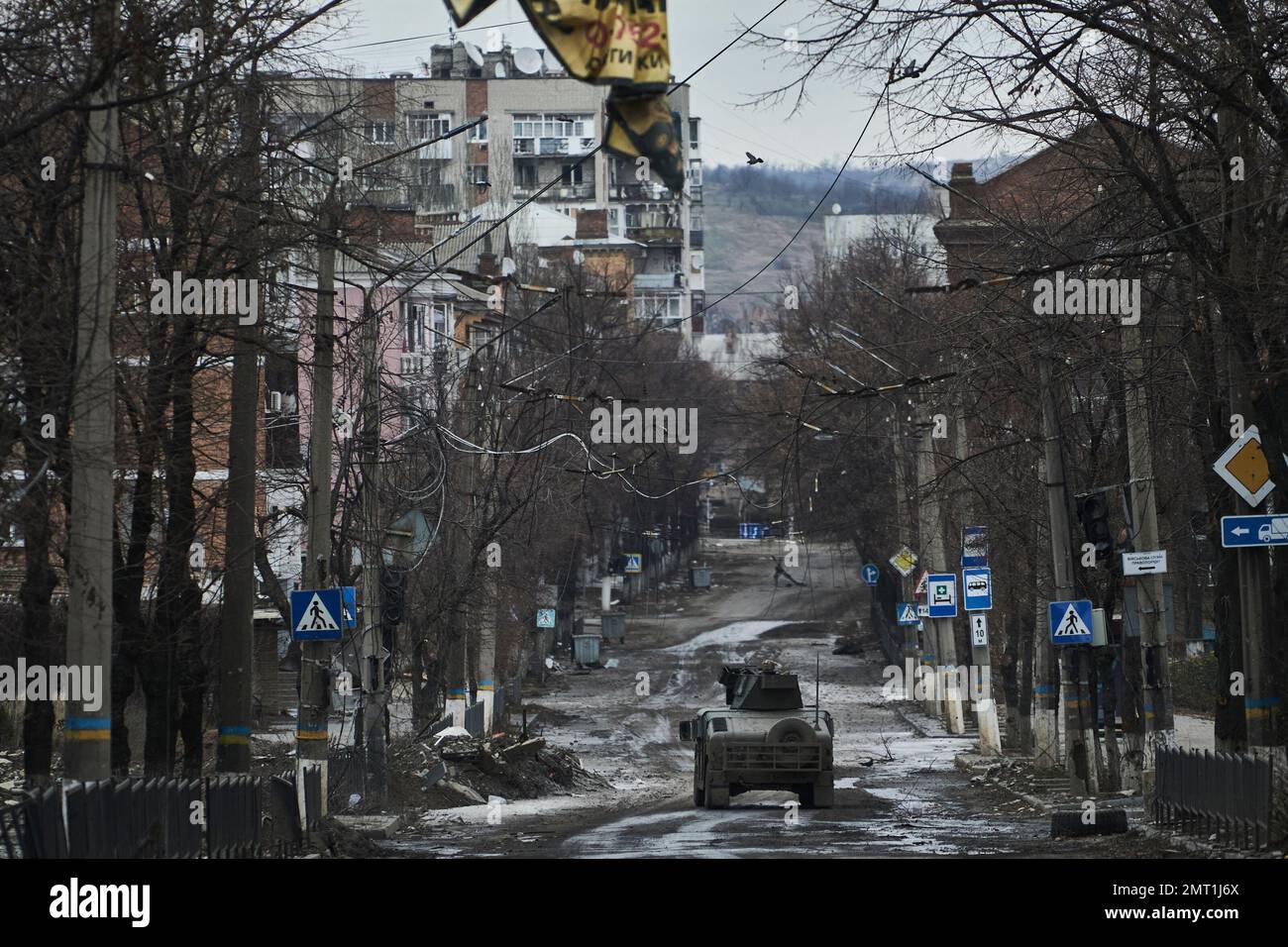 FILE - Ukrainian soldiers ride in a Humvee in Bakhmut, Donetsk region ...