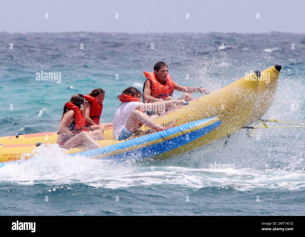 Miley Cyrus wears a mix and match bikini at a beach in the Bahamas and ...