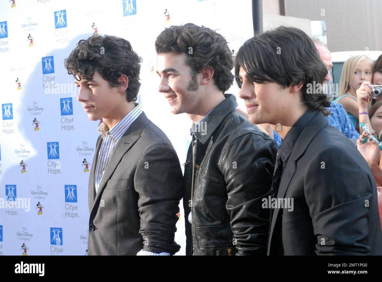Exclusive Miley Cyrus And The Jonas Brothers Pose For Photos Before