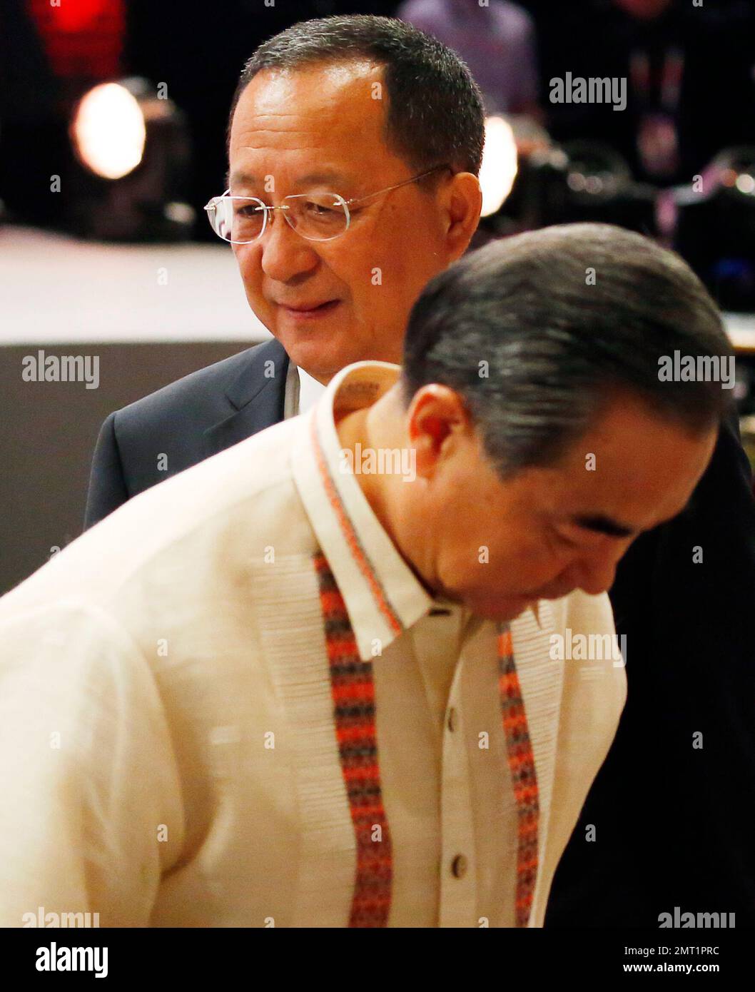 North Korean Foreign Minister Ri Yong Ho, back, arrives for the closing ...