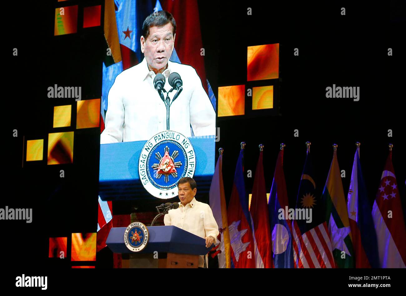 Philippine President Rodrigo Duterte addresses delegates at the closing ...