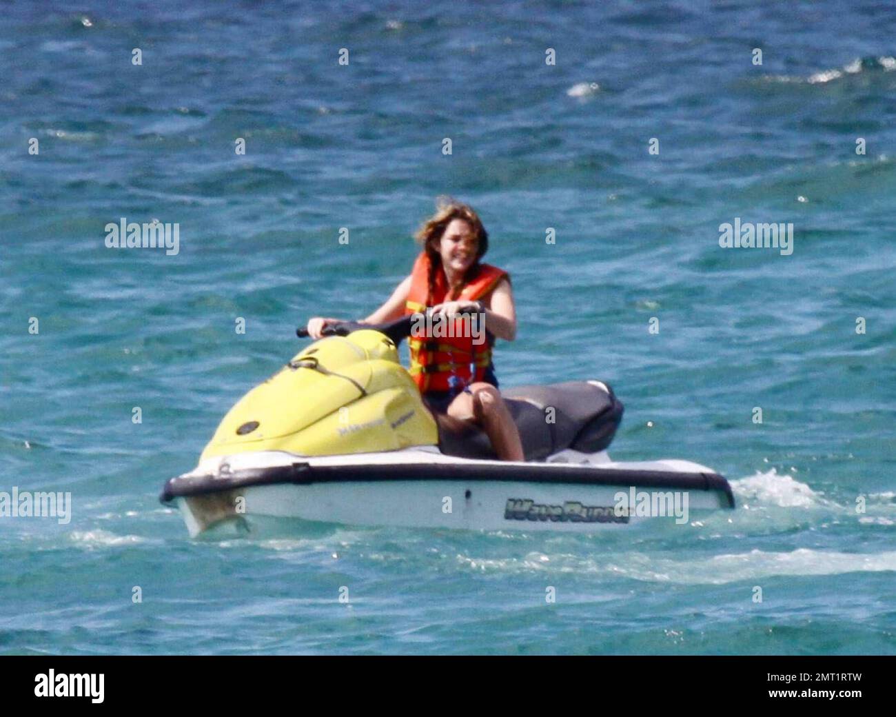 Exclusive!! Miley Cyrus enjoys a day at the beach jetskking with her ...