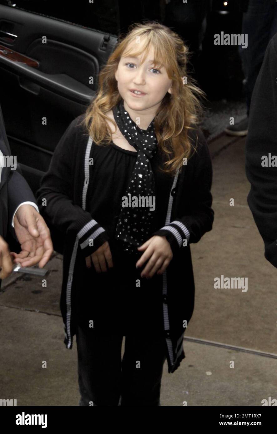 Miley Cyrus brings along a Starbuck's coffee as she arrives with sister ...