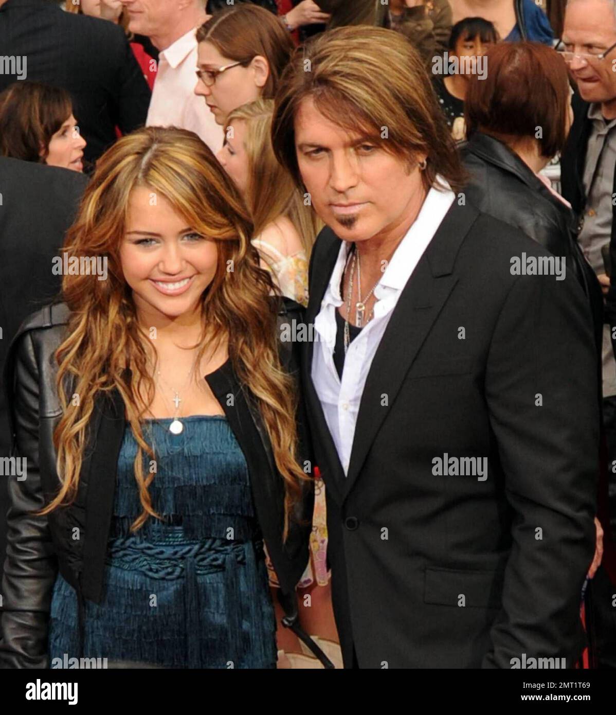 Miley Cyrus, accompanied by dad Billy Ray Cyrus, mom Leticia Cyrus ...