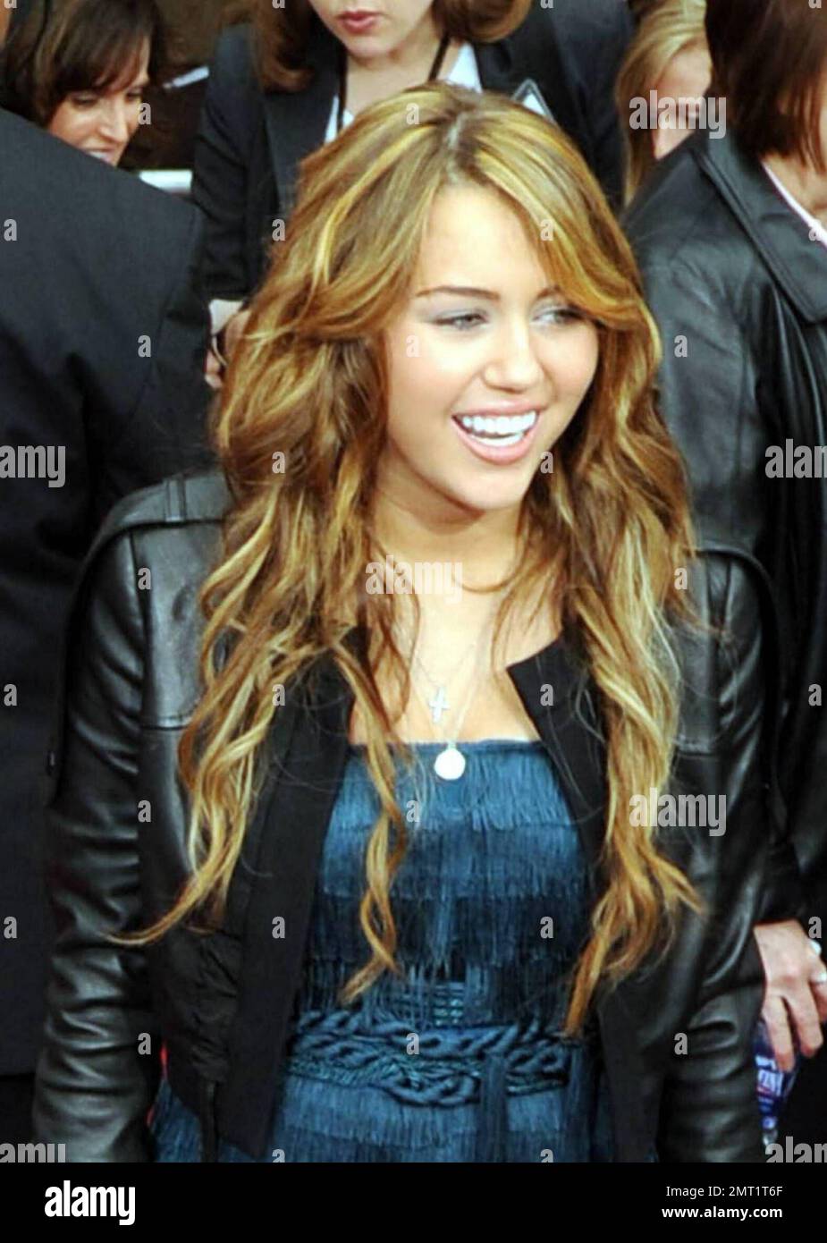 Miley Cyrus, accompanied by dad Billy Ray Cyrus, mom Leticia Cyrus ...