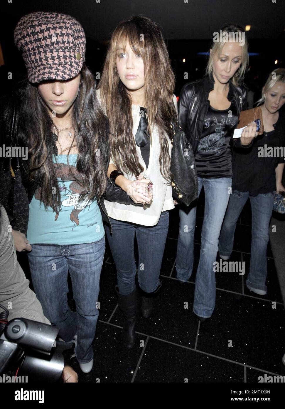 Miley Cyrus, her mom Tish, and some other family get in some shopping ...