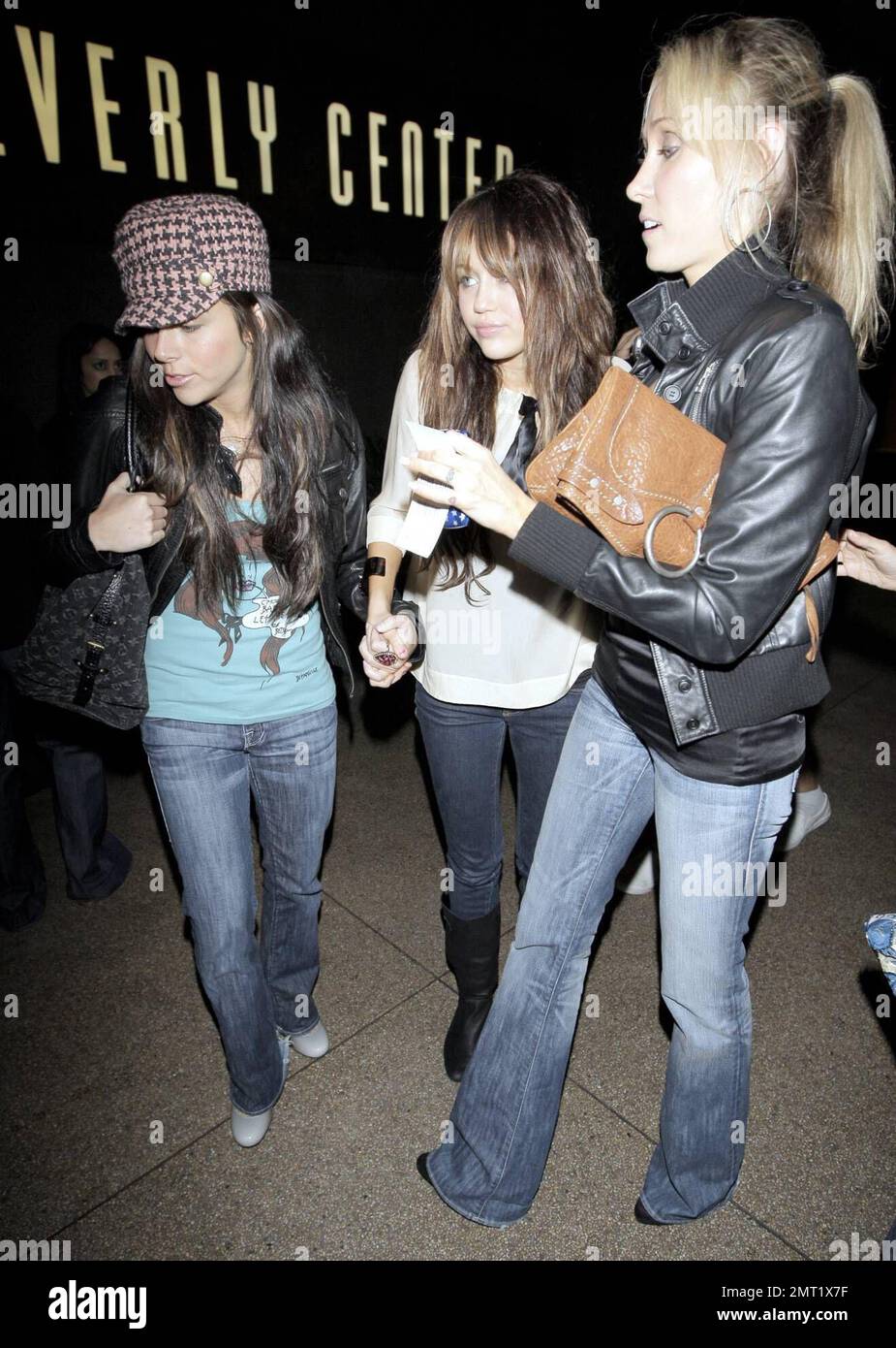 Miley Cyrus, her mom Tish, and some other family get in some shopping ...