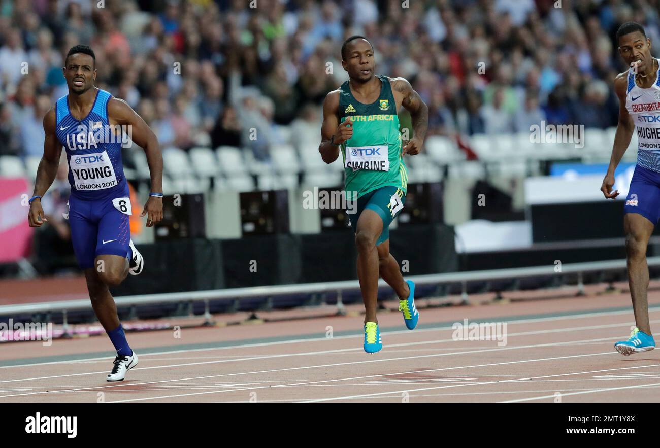United States' Isiah Young crosses the finish line next to South Africa ...