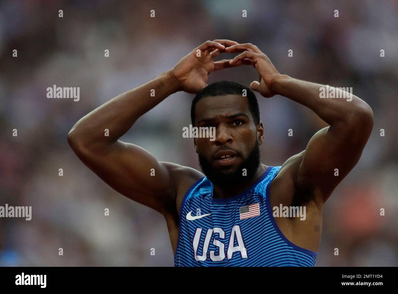 United States' Ameer Webb reacts after crossing the finish line during ...