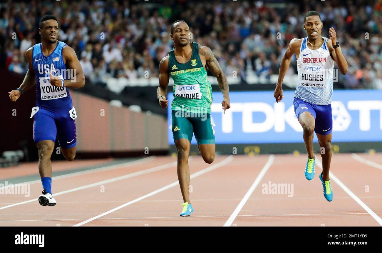 United States' Isiah Young, South Africa's Akani Simbine and Britain's ...