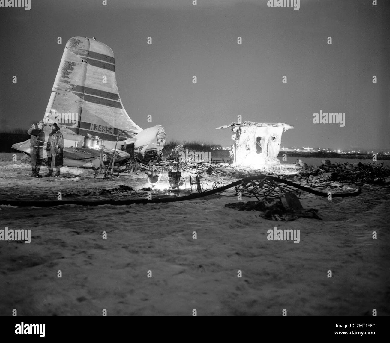 The shattered wreckage of a Northeast Airlines plane lies on Rikers ...