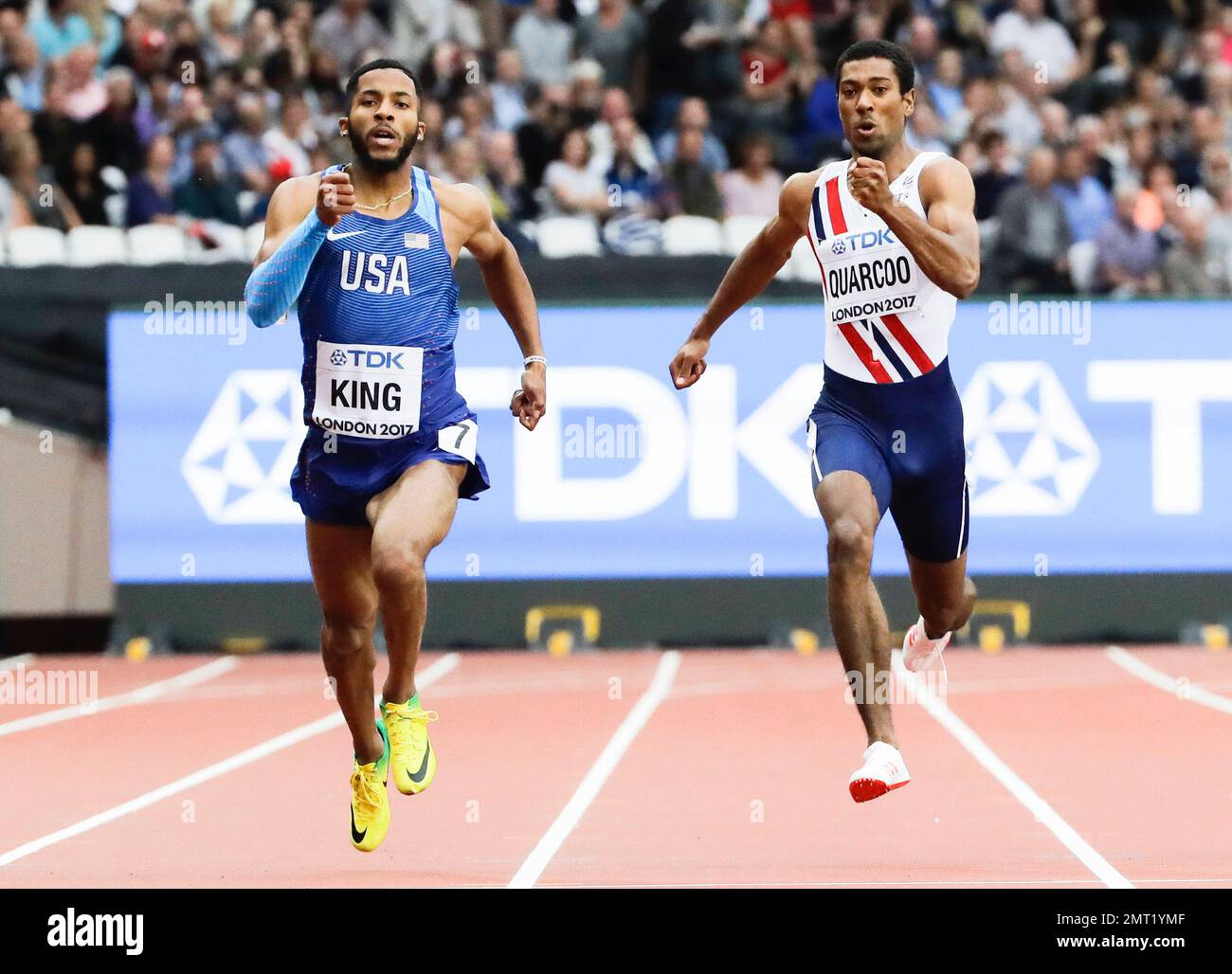 United States' Kyree King, left, and Norway's Jonathan Quarcoo compete ...