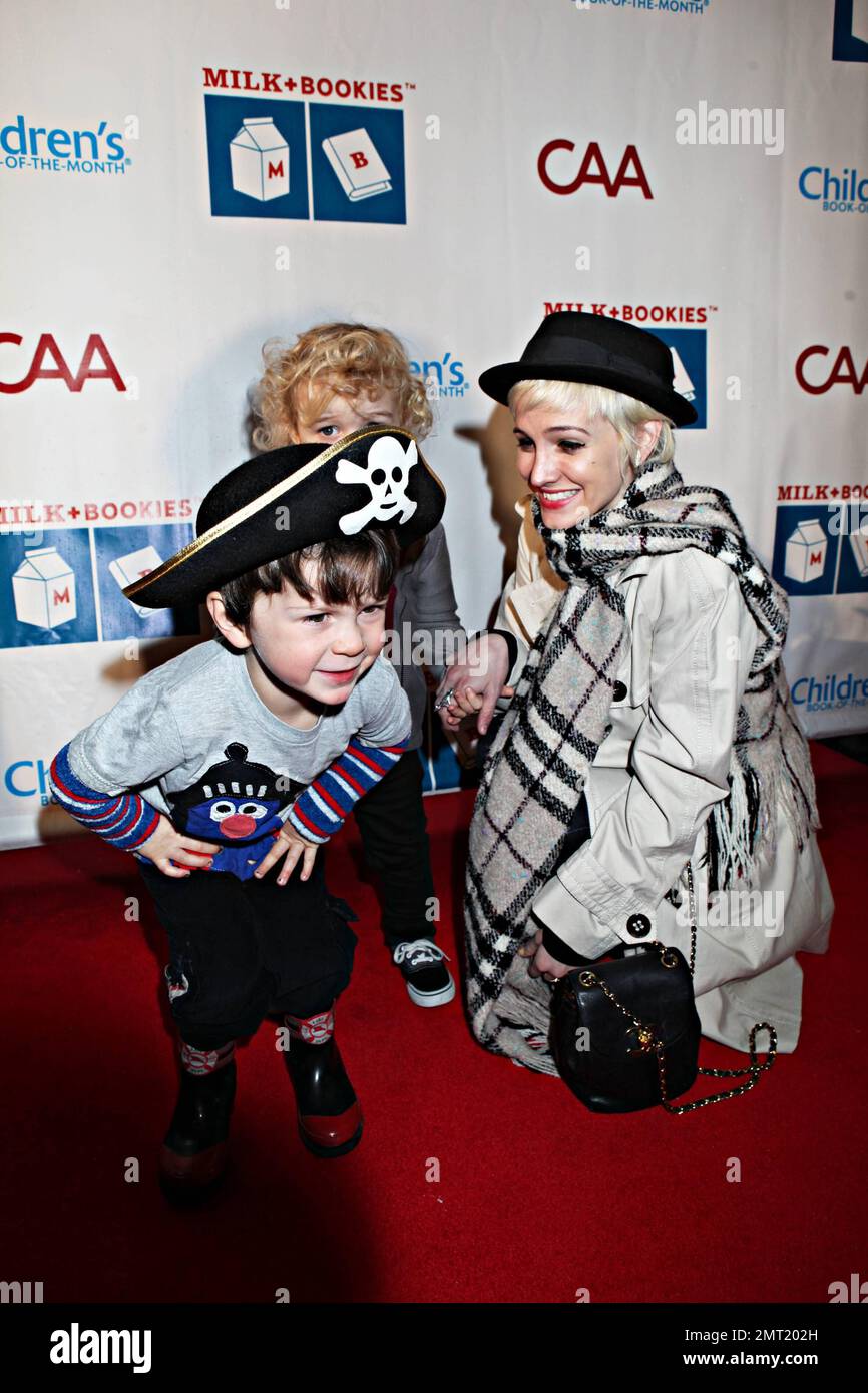 A little boy stands in front of Ashlee Simpson and son Bronx Wentz at ...
