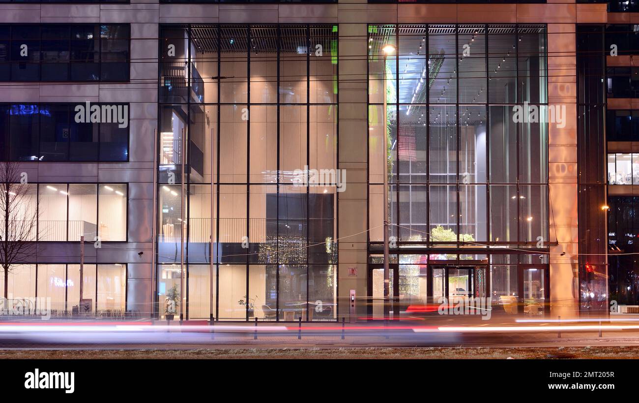 Corporate building at night - business concept. Glass wall office ...