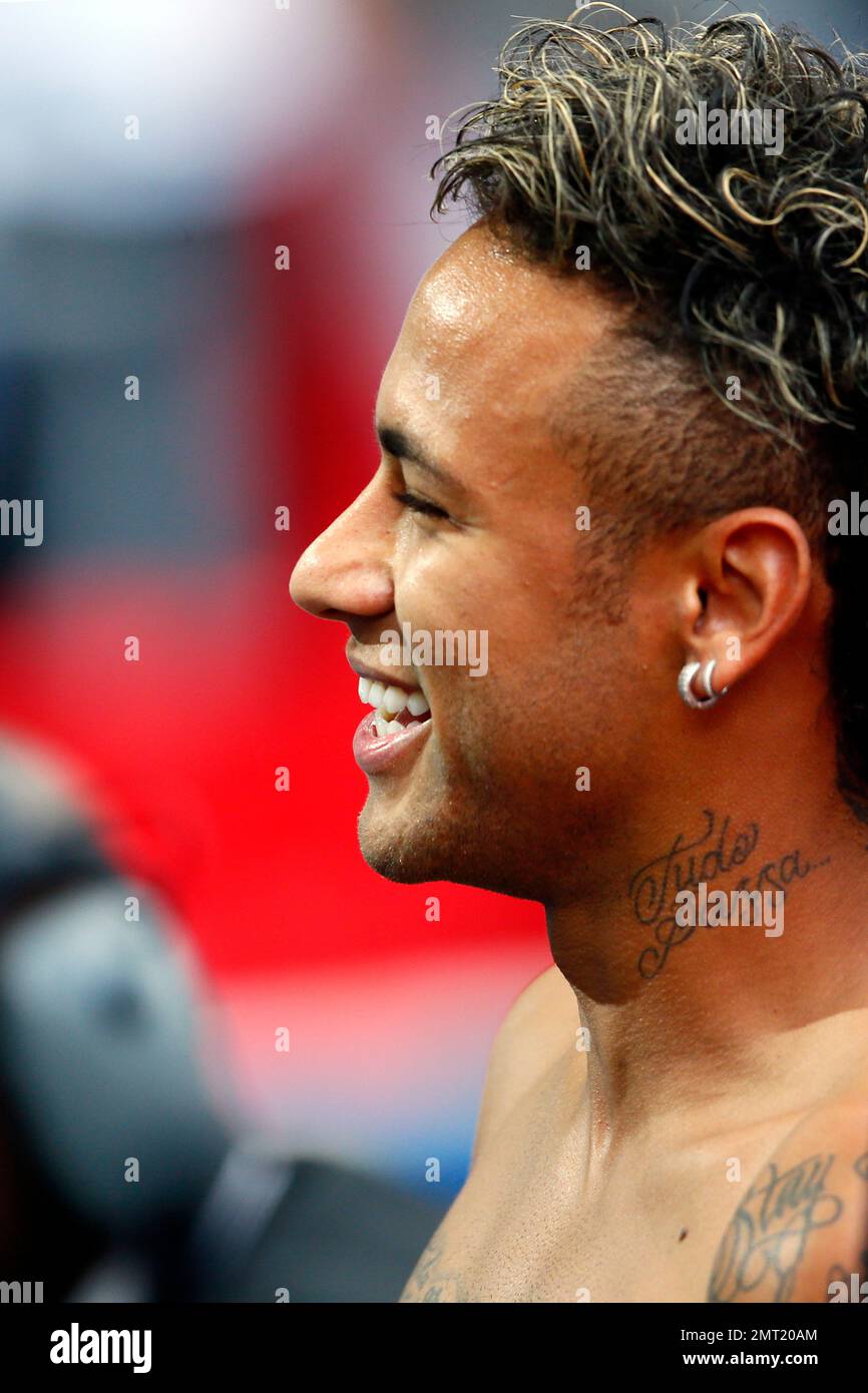 Brazilian soccer star Neymar smiles at the Parc des Princes stadium in ...