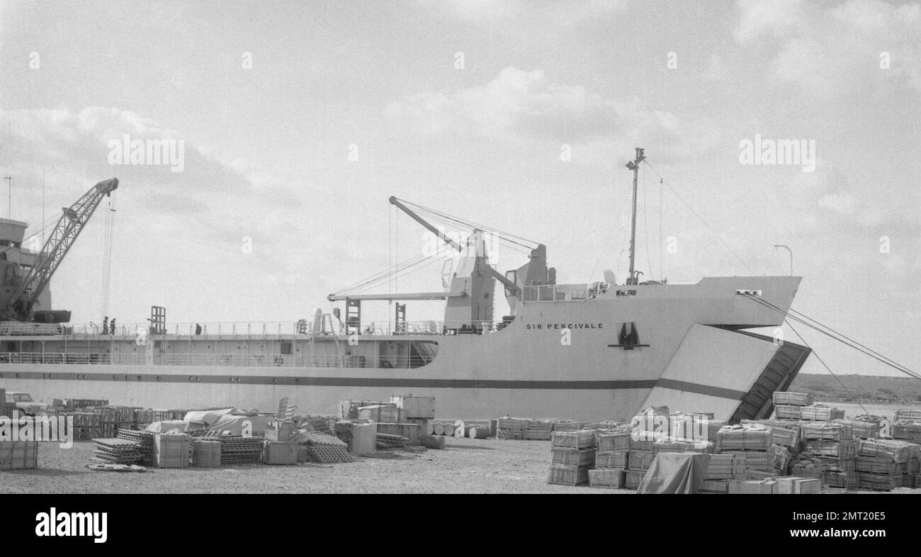 The British ship Sir Percivale waits at a pier of the Libyan port of ...