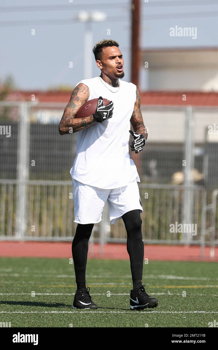 Chris Brown attends the 4th Annual Athletes vs Cancer Celebrity Flag ...