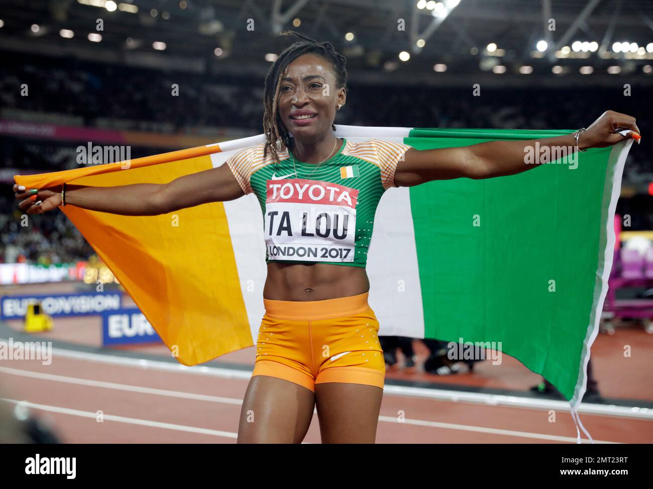 Ivory Coast's Marie-Josee Ta Lou celebrates after winning the silver ...