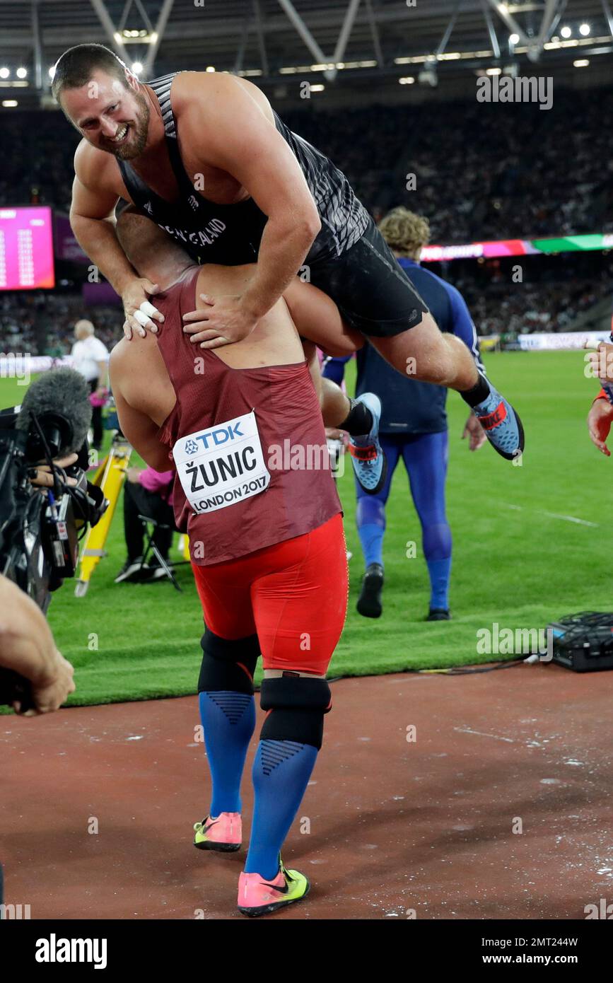 New Zealand's Tomas Walsh celebrates with Croatia's Stipe Zunic after ...
