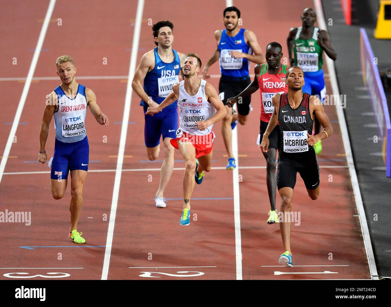 Canada's Brandon Mcbride crosses the finish line to win his Men's 800 ...