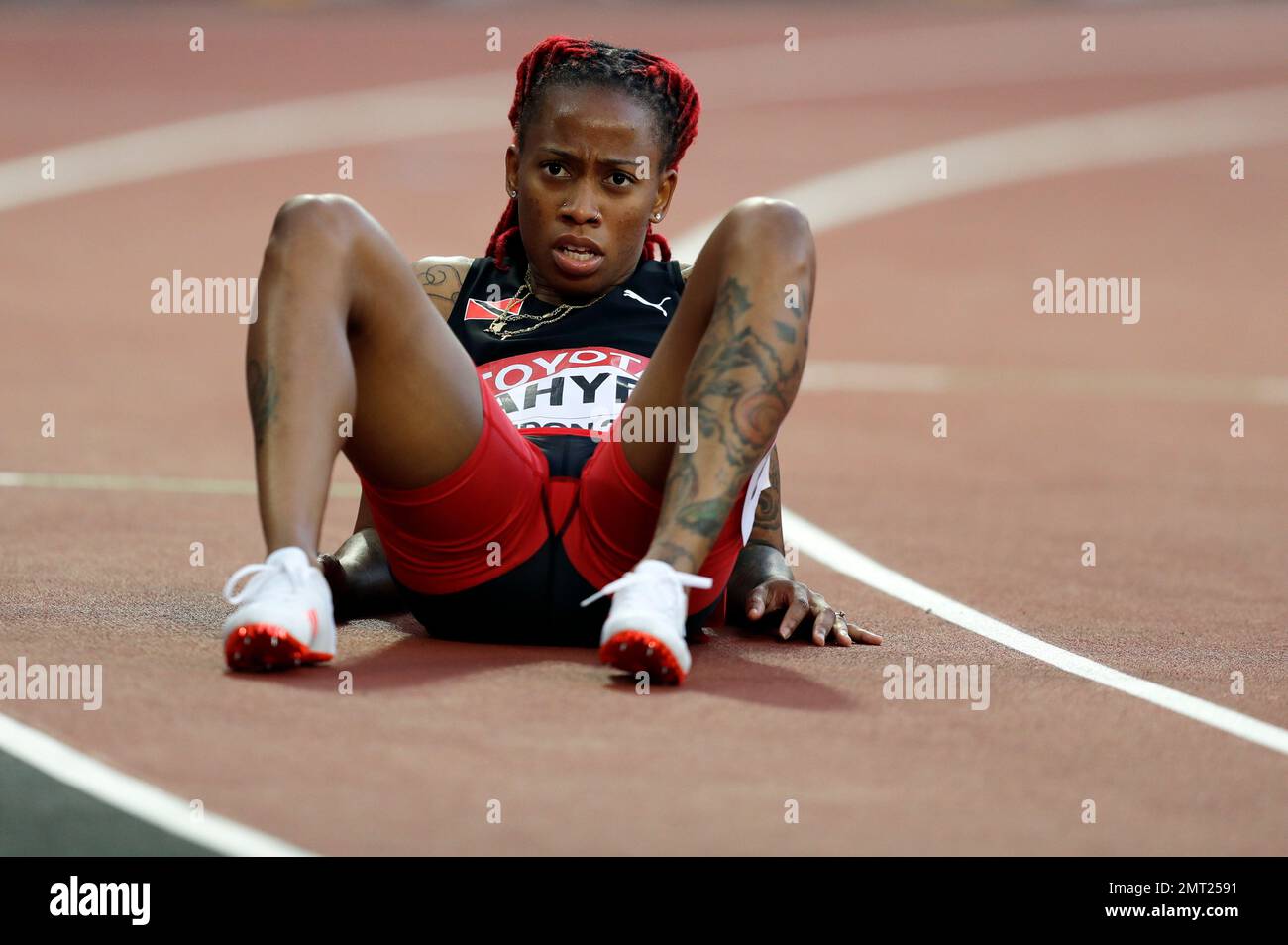 Trinidad and Tobago's Michelle-Lee Ahye reacts after finishing her ...